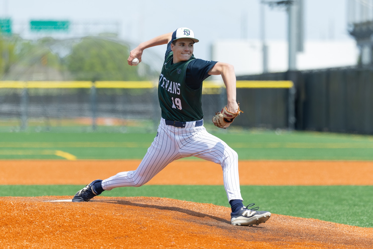 Photo Story: New Trier baseball survives and advances to sectional play ...